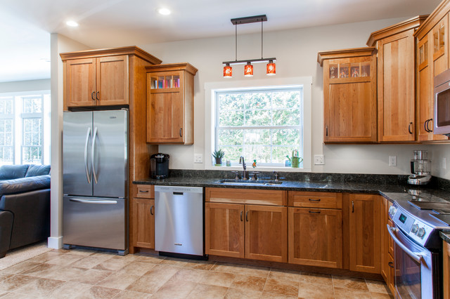 Natural Cherry Shaker kitchen with dark granite countertops ...