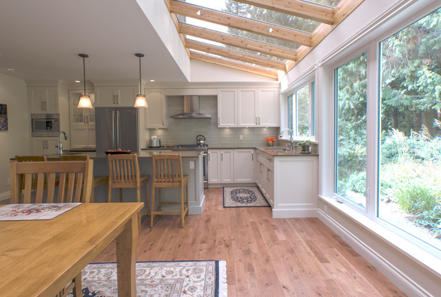 Open Concept Kitchen & Dining Area With Skylights - Transitional ...