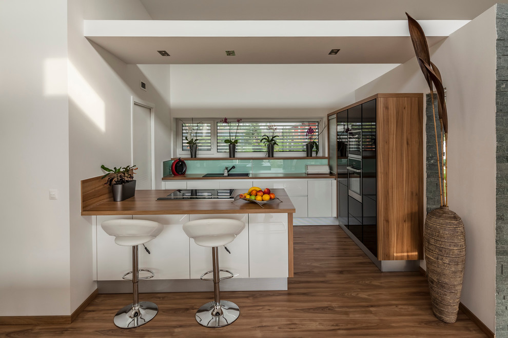 Orientated to the garden pond - Modern - Kitchen - Other - by TÓTH ...