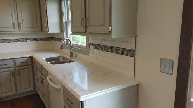 Orion, IL Updates-Painted Cabinets Silver Mist MSI Calacatta Laza ...