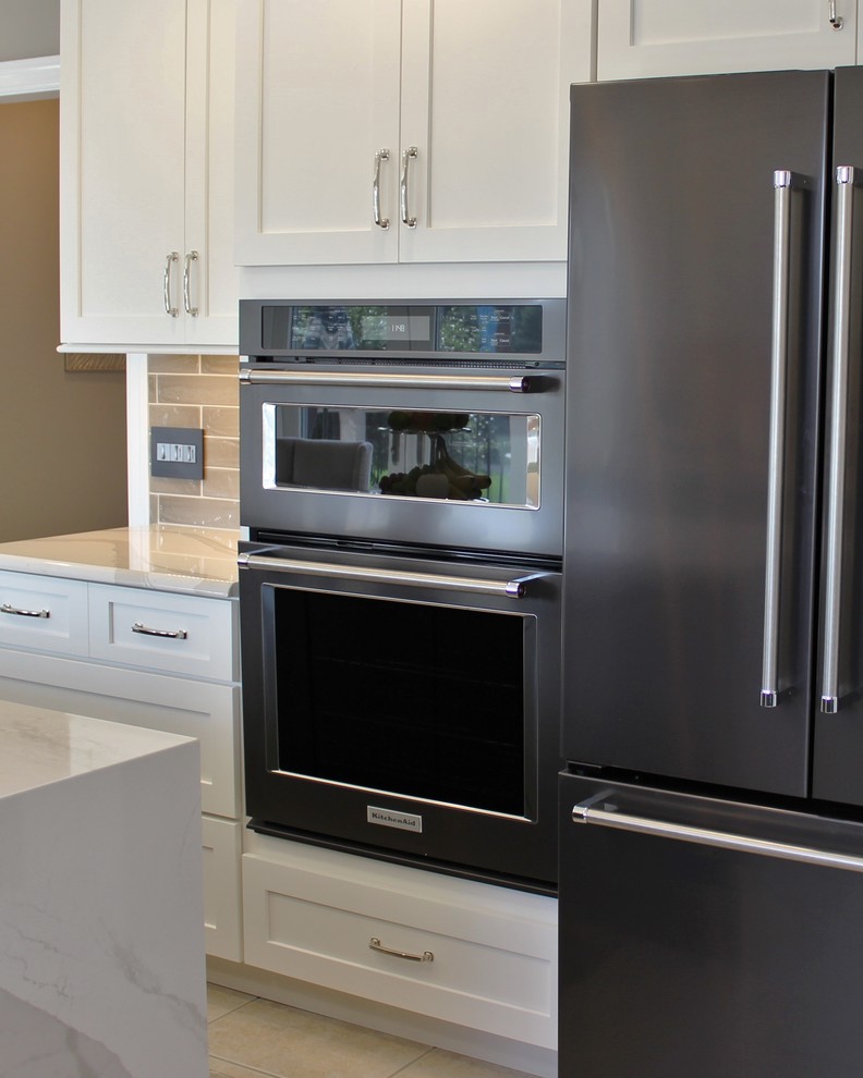 Quad Cities Kitchen With Gray Base Cabinets and Waterfall Counters ...