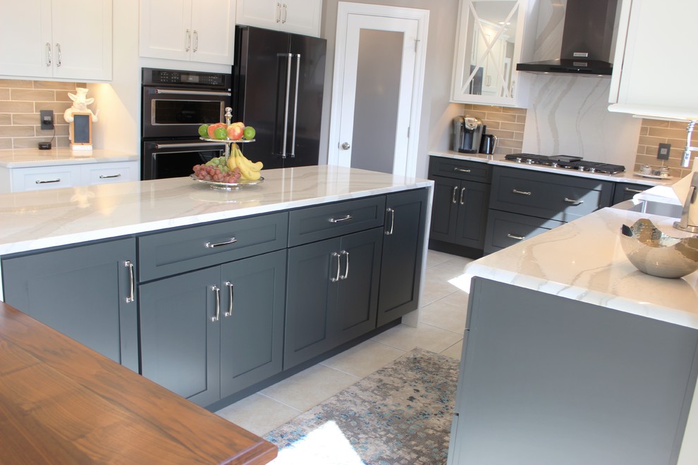 Quad Cities Kitchen With Gray Base Cabinets and Waterfall Counters ...