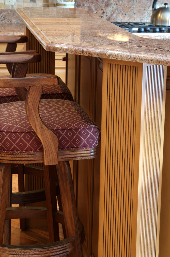 Raised Kitchen Bar at Island with Reeded Posts and Custom Upholstered ...