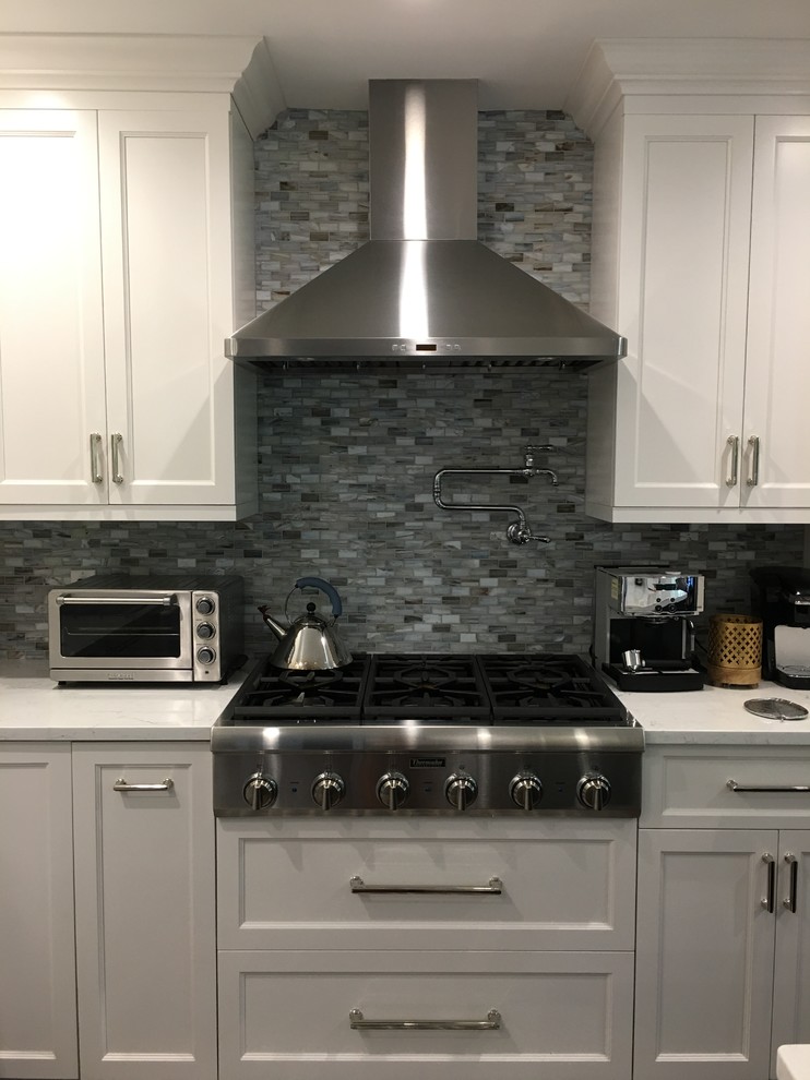 Range top with stainless hood - Transitional - Kitchen - New York - by ...