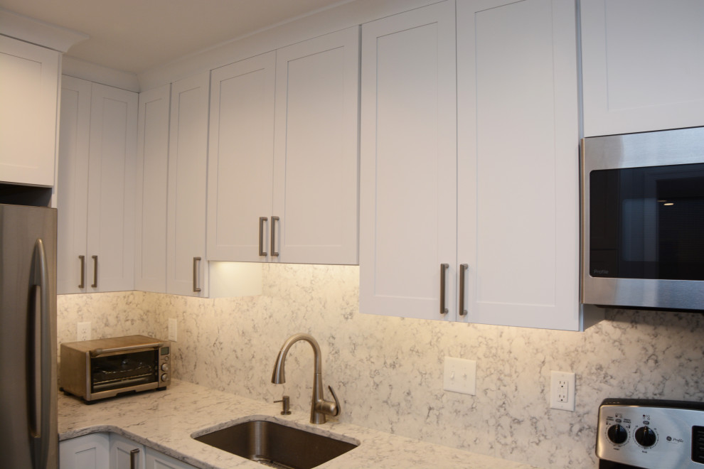 Rockville, MD All White Quartz Condo Kitchen Countertops - Transitional ...