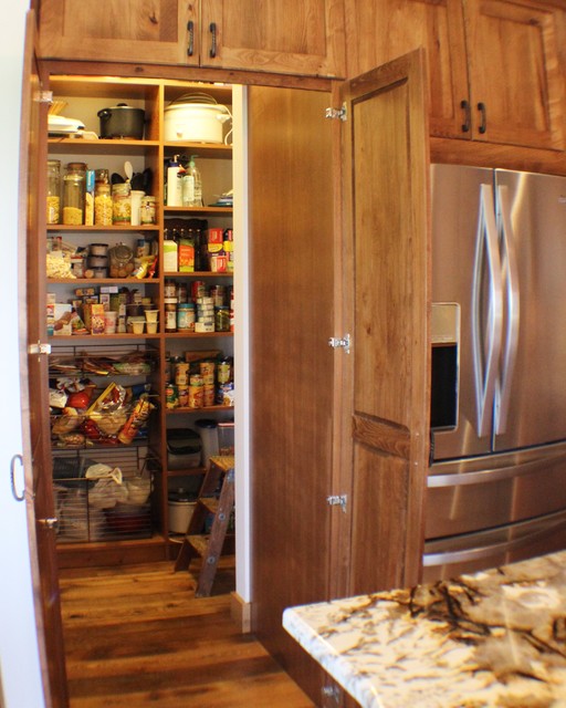 Rustic Finishes Reveal Hidden Storage Solutions - Rustic - Kitchen ...