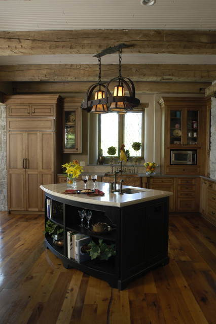 Rustic Kitchen with Reclaimed Knotty Heart Pine Floors and WoodMode ...