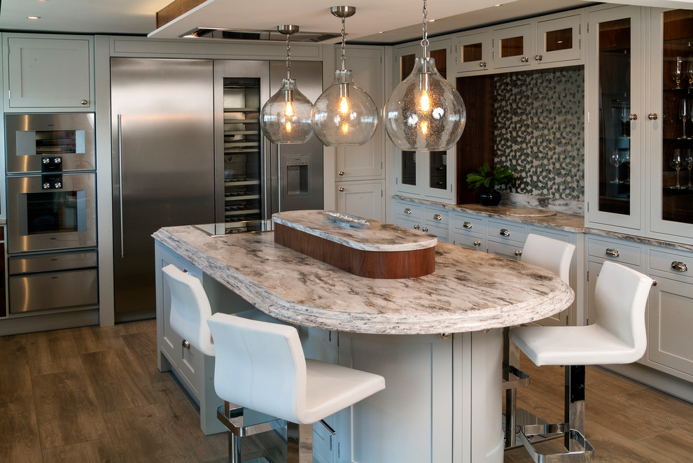 Soft grey kitchen featuring marbled granite worktops - Farmhouse ...