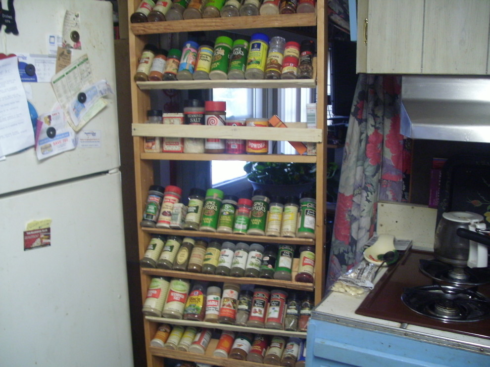 Spice rack on wheels rolls in beside fridge when not in use - Kitchen ...