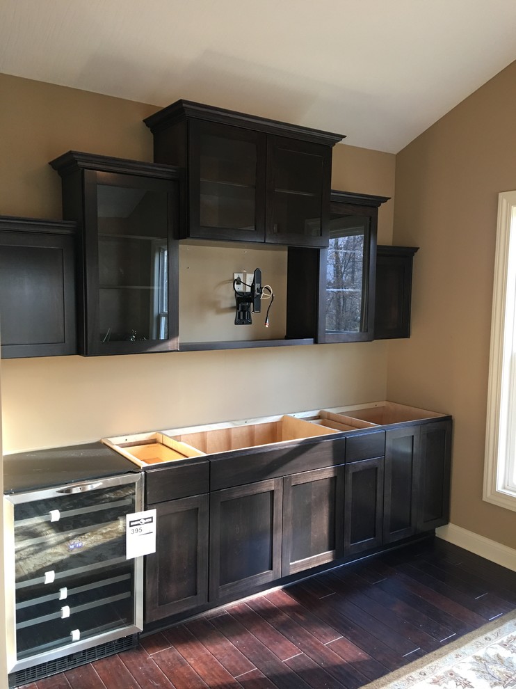 Staggered uppers with full overlay glass doors. - Traditional - Kitchen ...