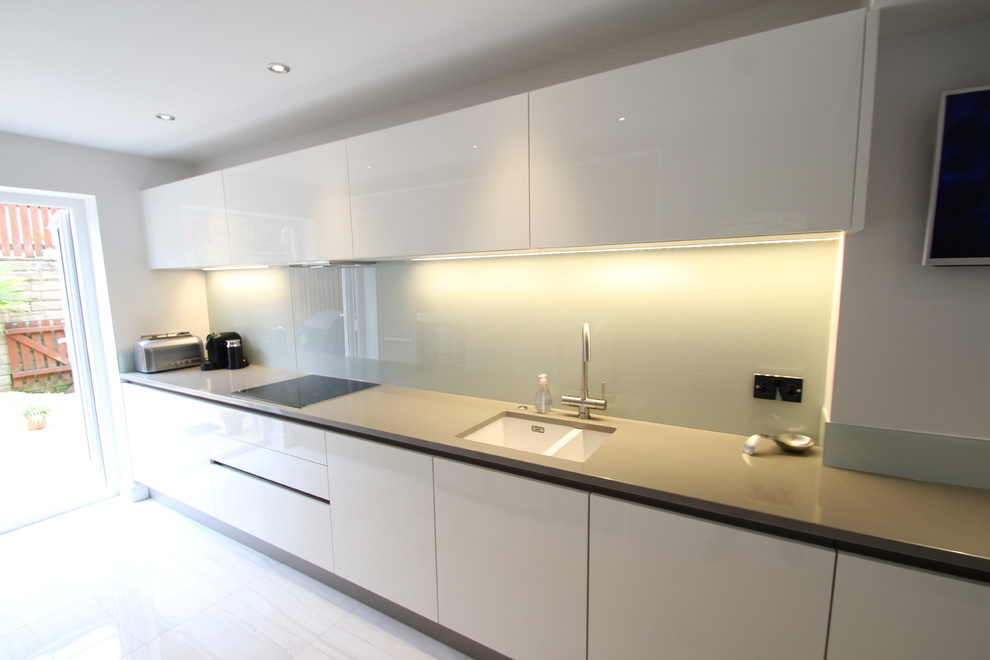 Stunning galley kitchen with plenty of storage - Modern - Kitchen ...