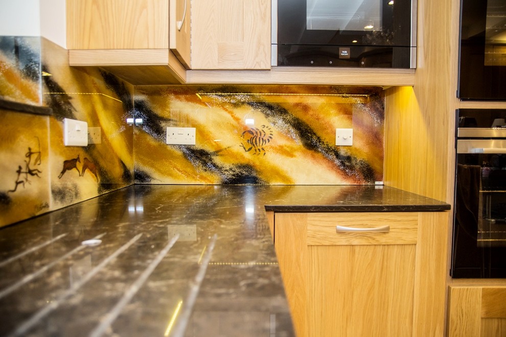 "THE CAVEMAN" bespoke kitchen splashback by designer Juliet Eve ...