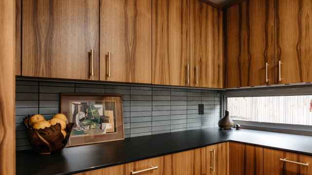 Thin Dark Porcelain Kitchen Countertop with Grain-matched Cabinets ...