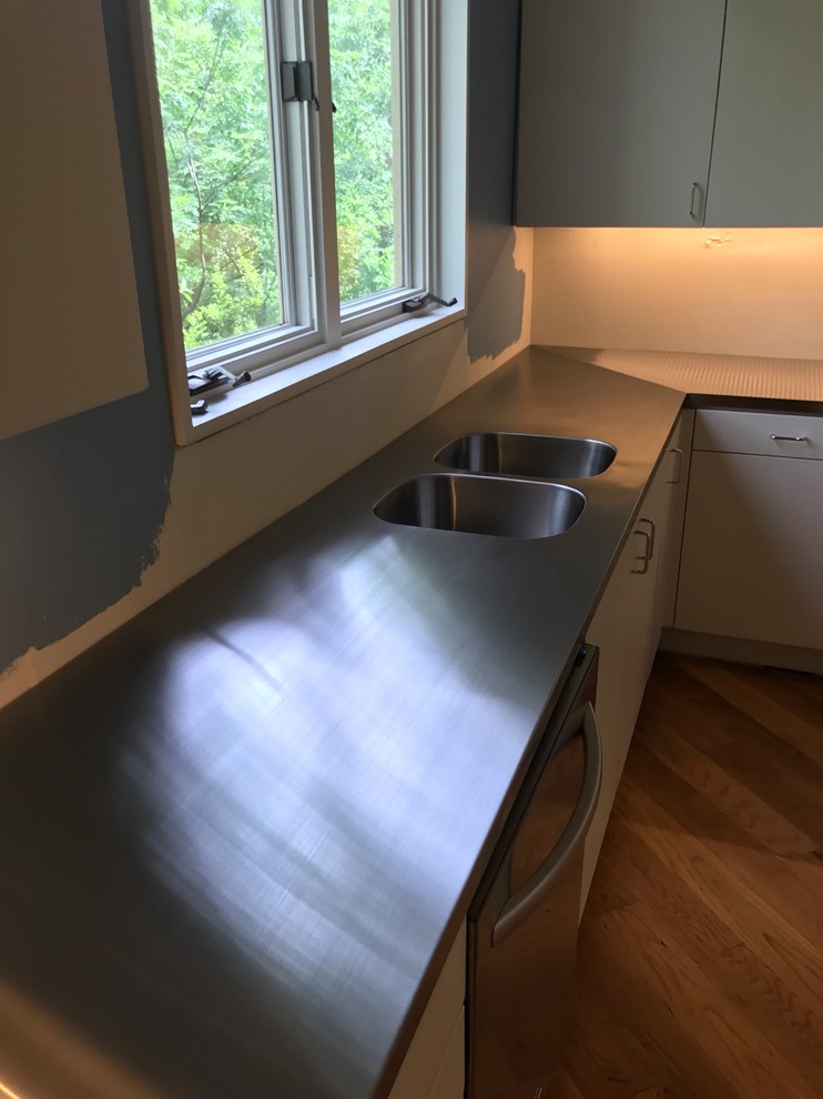 This stainless counter was 13' x 6' .... integral welded sinks, and ...