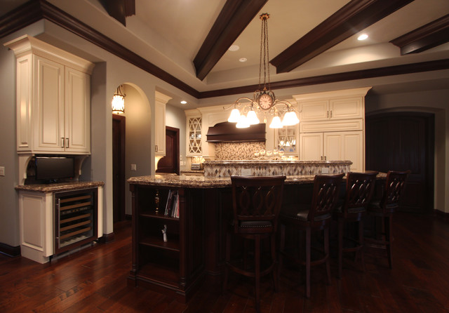 Three Level Island with Off White Painted Cabinets and Dark Stained ...