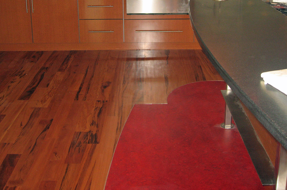 Tigerwood Flooring with a Marmoleum Inlay and Aluminum Feature Strip ...
