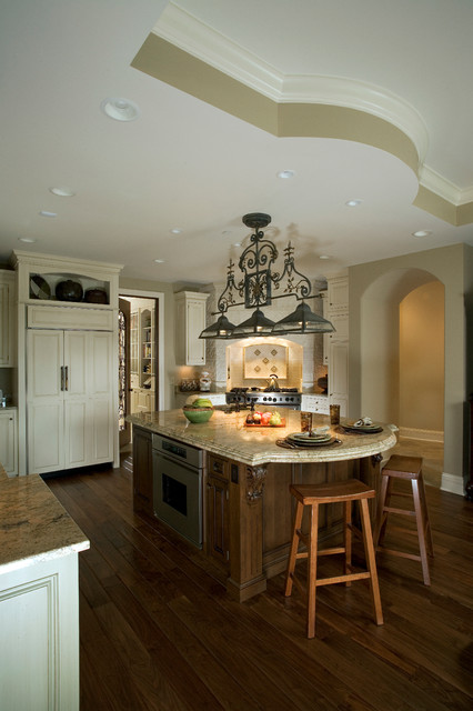 Traditional kitchen with curved tray ceiling to match the curve in the ...