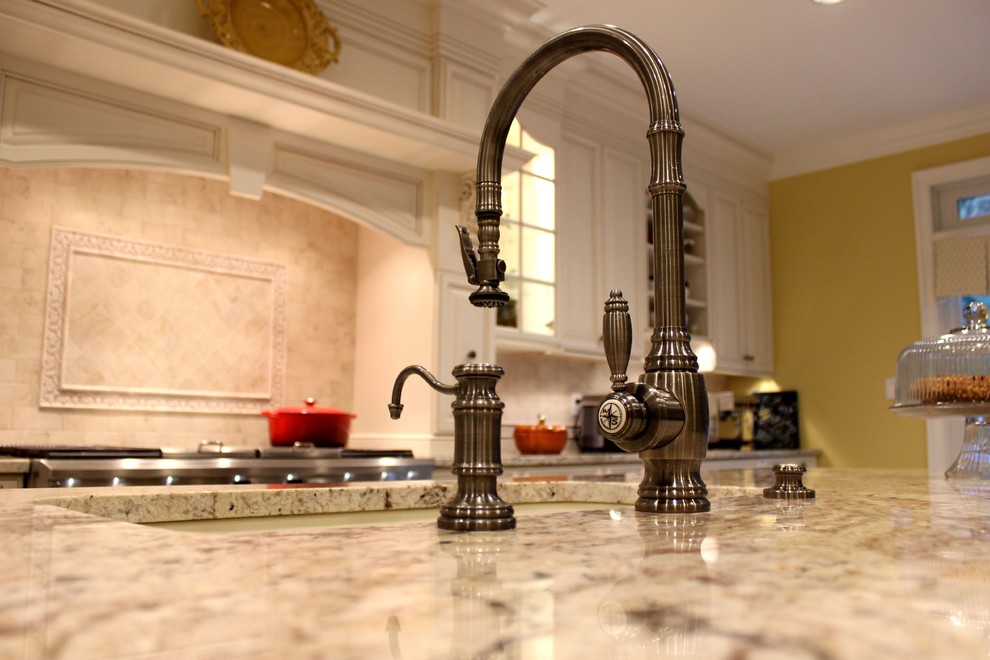Traditional Mediterranean Kitchen with high-end pull-down faucet in ...