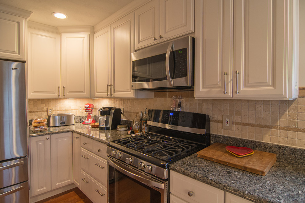 Traditional raised panel kitchen with granite countertops and bathroom ...