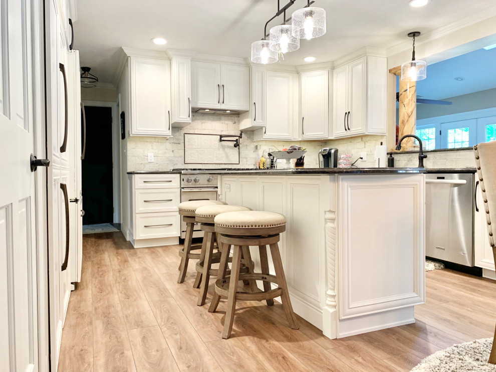 Traditional Style Kitchen Remodel With Ivory Painted Cabinets and Dark ...