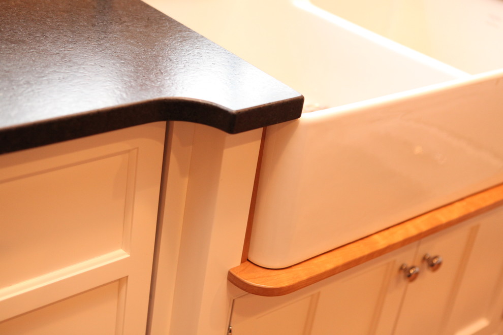 Traditional white kitchen cabinets in Wesley Ellen timber-frame ...