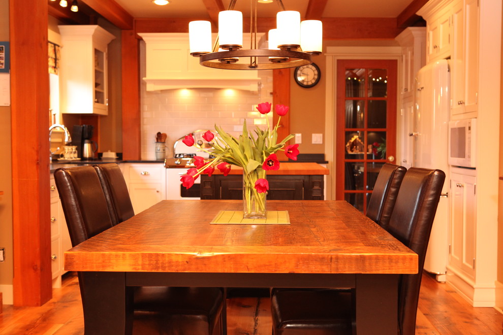 Traditional white kitchen cabinets in Wesley Ellen timber-frame ...