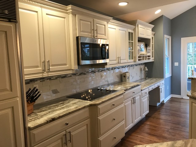 Traditional White Raised Panel with Fantasy Brown Counter tops ...