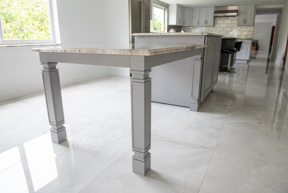 Transitional Kitchen Done in a 2 Tone Color With Integrated Dining ...