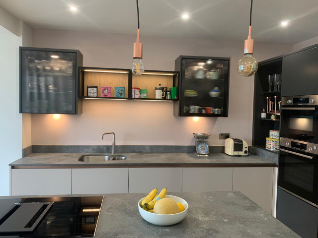 True Handleless Kitchen in Cashmere and Graphite with Concrete Worktops ...