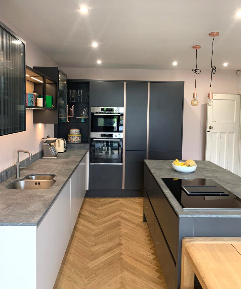 True Handleless Kitchen in Cashmere and Graphite with Concrete Worktops ...