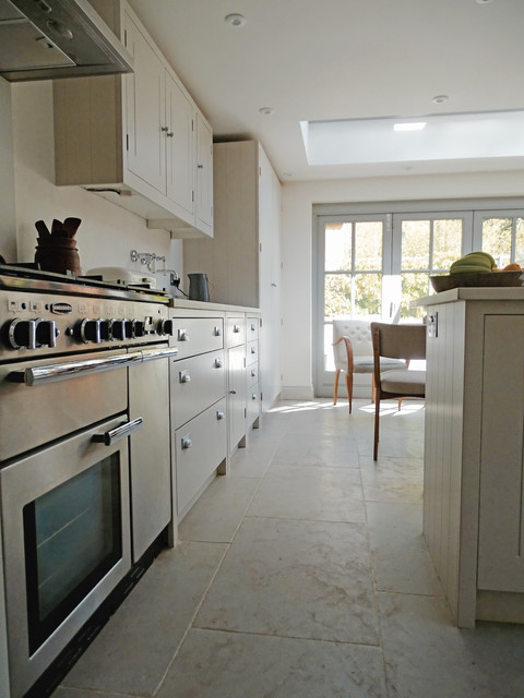Two roof lanterns and a set of bi-fold doors complement a kitchen ...