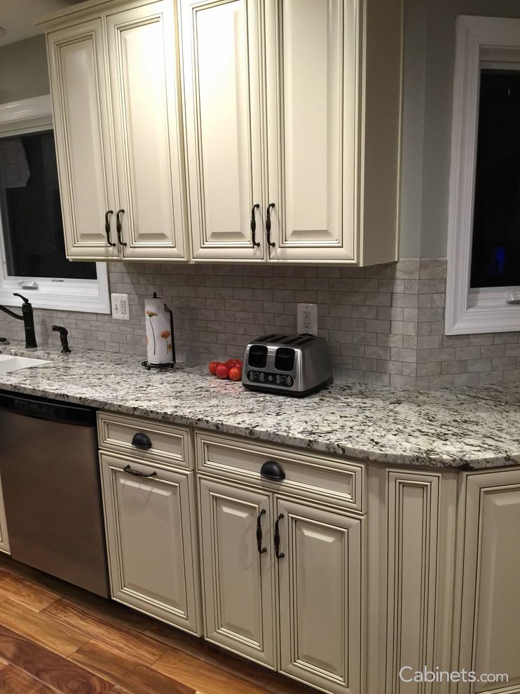 Two-Toned Kitchen with Traditional Cabinet Door Style and Large Island ...