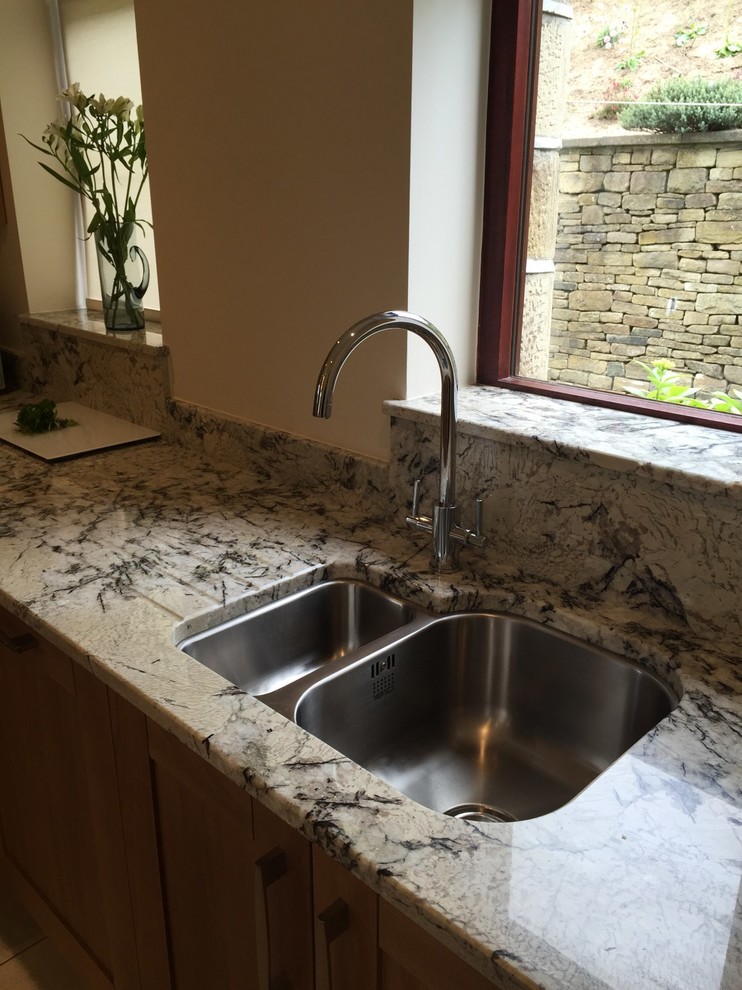 Warm up your kitchen with a classic, light wood design, that family ...