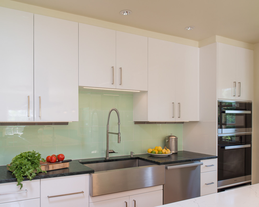 White Cabinets, Glass Sheet Backsplash, and a Stylish Sink ...