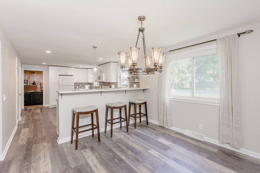 White Cabinets w/ Bar Height Peninsula - Modern - Kitchen - New York ...
