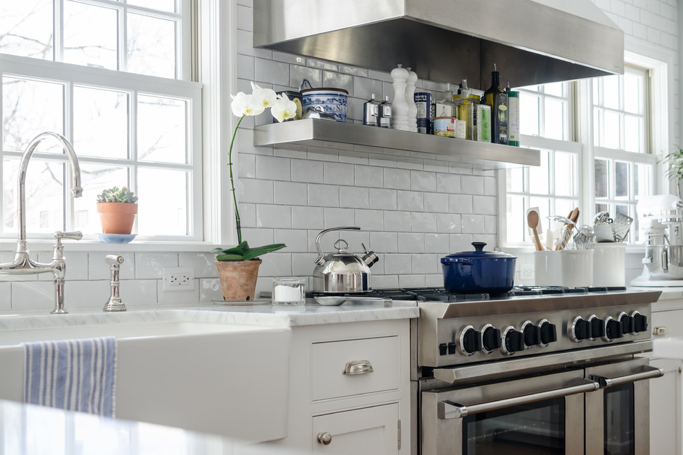 White Country Kitchen with Marble Counters and Plenty of Storage ...