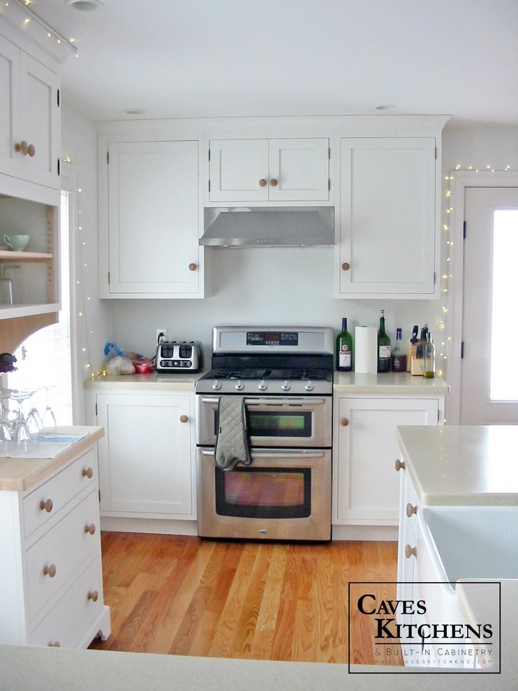White Eclectic Kitchen with Two Tiered Peninsula - Eclectic - Kitchen ...