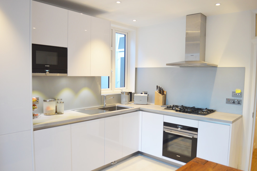 White Handleless Kitchen in Putney - Contemporary - Kitchen - London ...