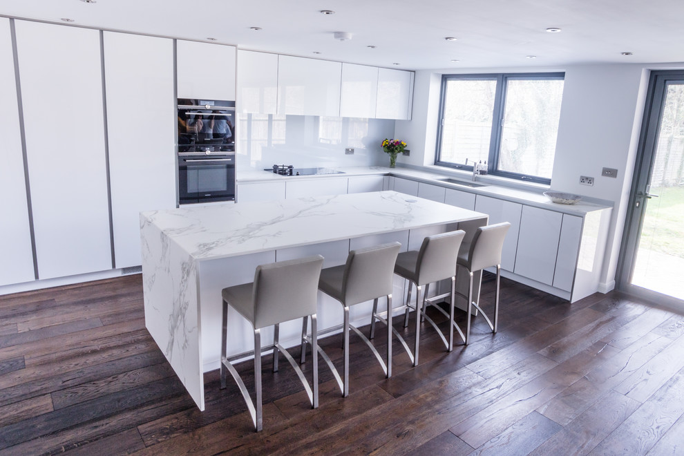 White Handleless Kitchen with 3D edging & Dekton Worktop - Kitchen ...
