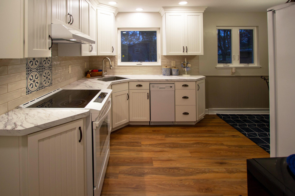White Kitchen with Calcutta Marble Laminate Countertop and Tile ...