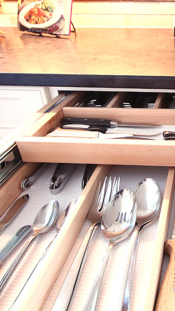White Kitchen with Five Piece Drawer Fronts and Granite Countertop ...