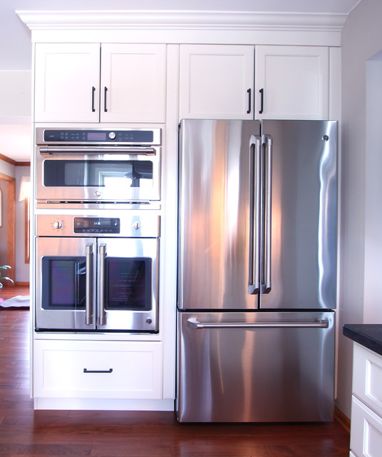 White Kitchen with Five Piece Drawer Fronts and Granite Countertop ...