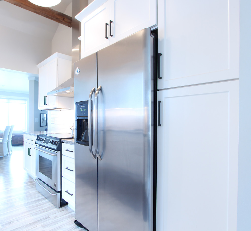 White Kitchen with Reclaimed Beams and Vaulted Ceiling - Farmhouse ...