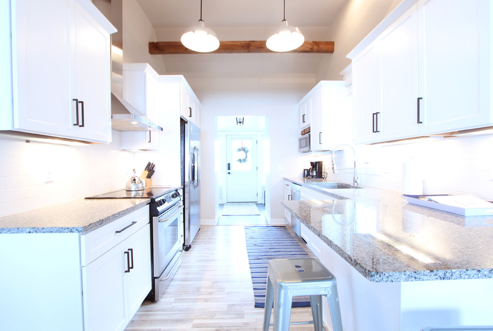 White Kitchen with Reclaimed Beams and Vaulted Ceiling - Farmhouse ...