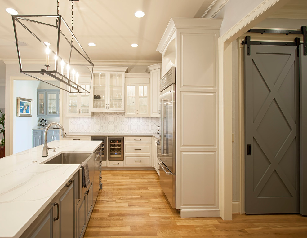 White Transitional Kitchen Featuring Double Islands and Custom Barn ...