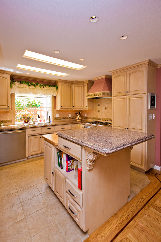 Wine themed kitchen with wine cooler and grape tile details ...