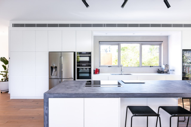 White Industrial Kitchen with Concrete Island Benchtops - Modern ...