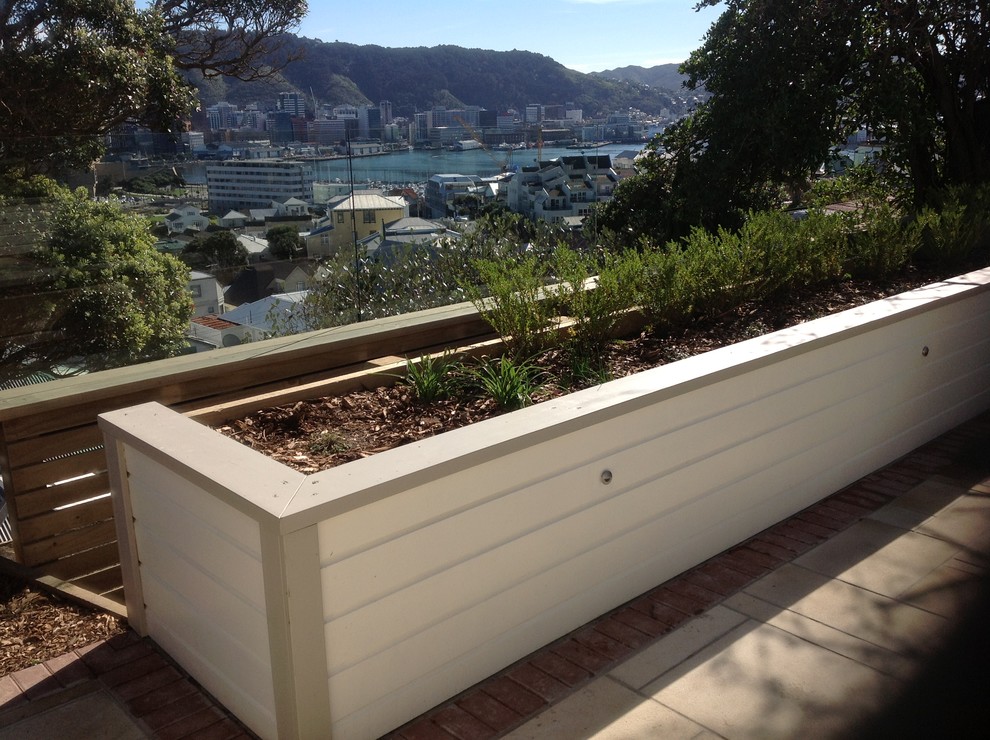 After: weatherboard planter, frameless glass balustrade - Contemporary ...