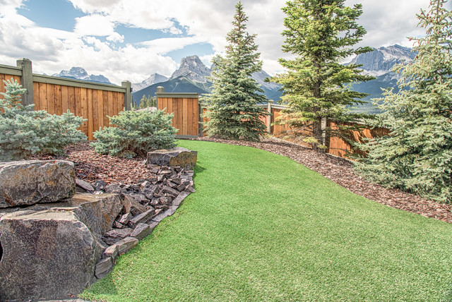 Backyard Exit with Artificial Grass, Rundle Stone Tailings & Bark ...