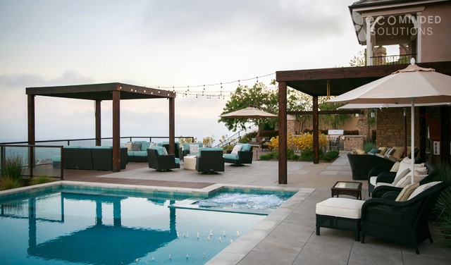 Backyard with Lap Pool, Hot Tub, Pergolas, Kitchen, and Living Spaces ...